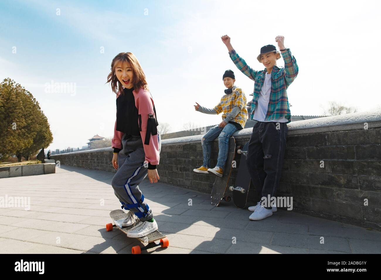 Young people skateboarding Stock Photo - Alamy