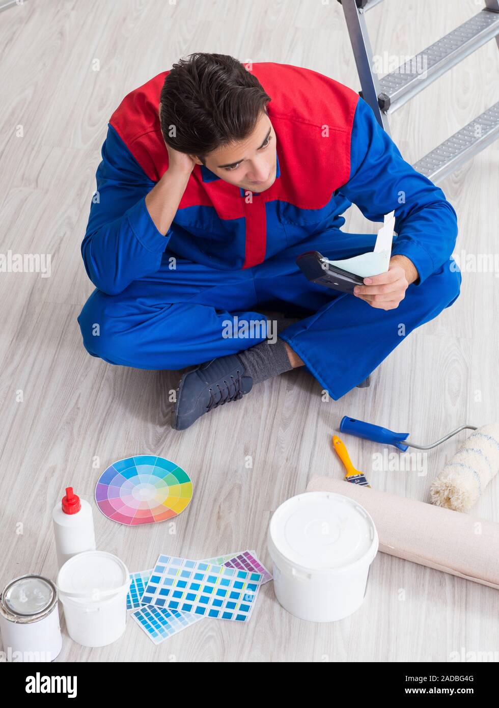 Young painter trying to match colours for painting hi-res stock ...