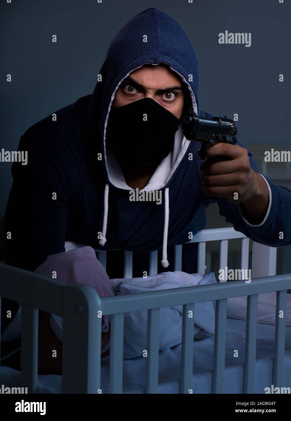 The criminal stealing baby in human child traficking concept Stock ...