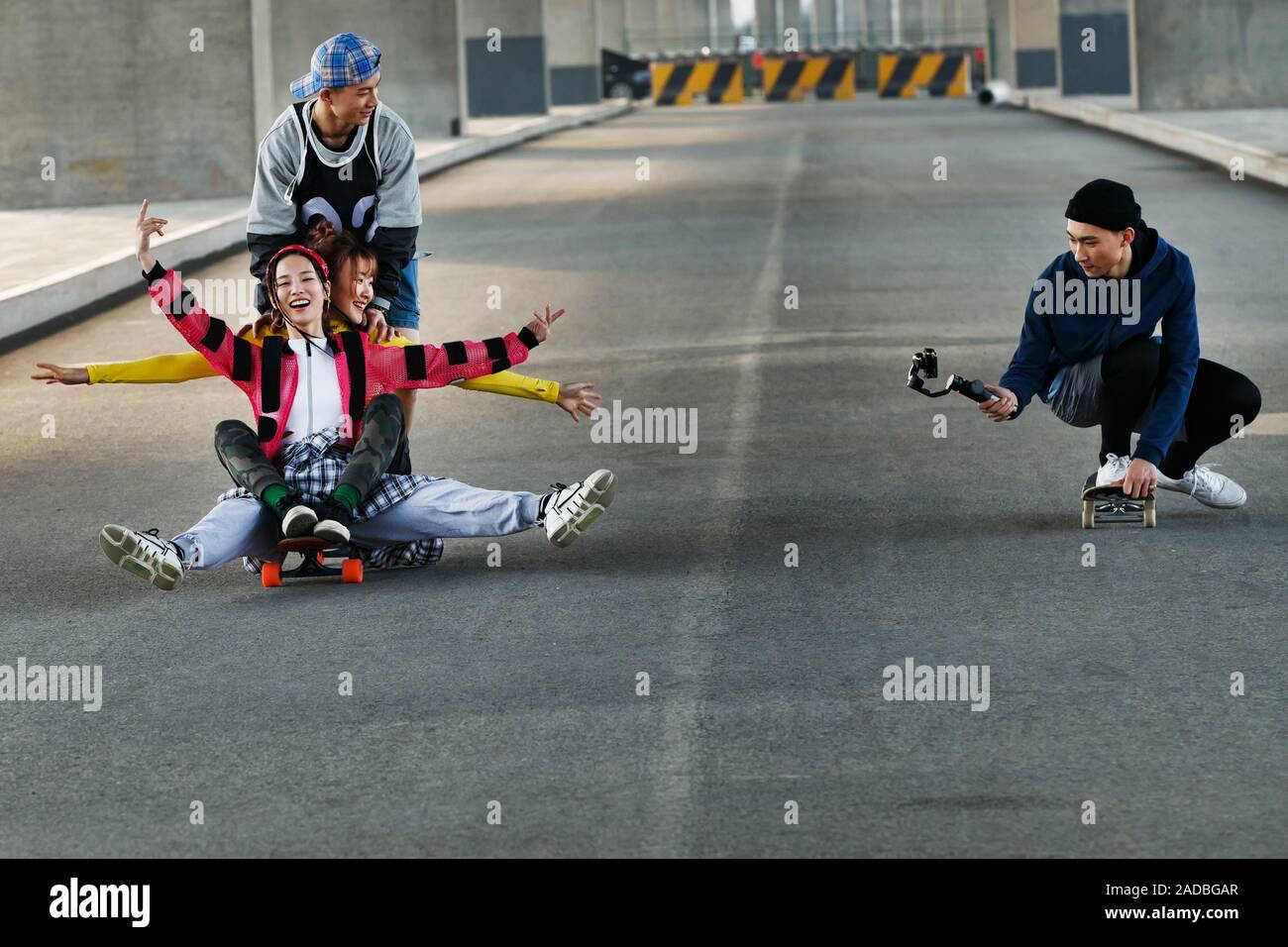 Young people skateboarding Stock Photo - Alamy