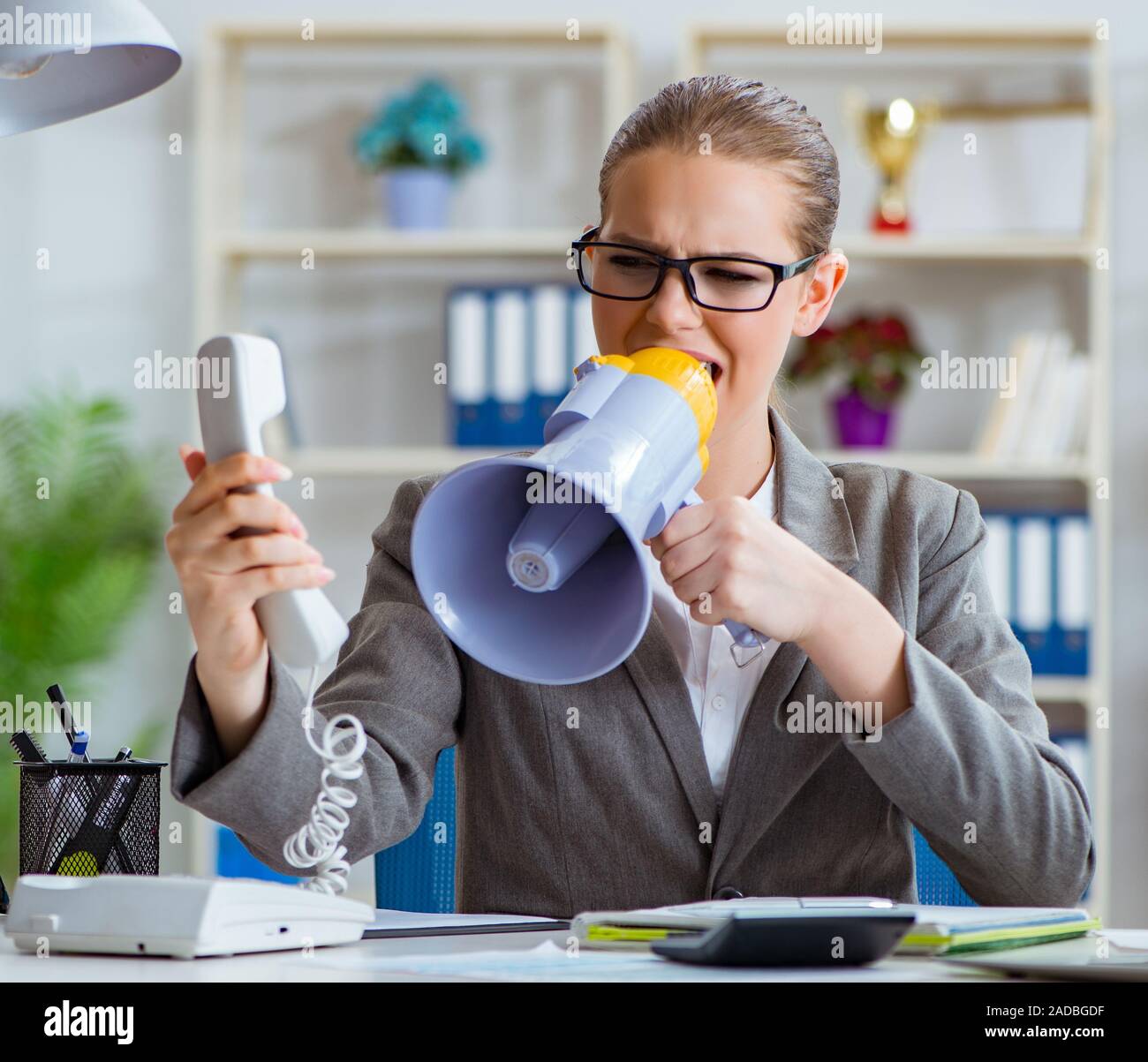 Office work loud talking phone hi-res stock photography and images - Alamy