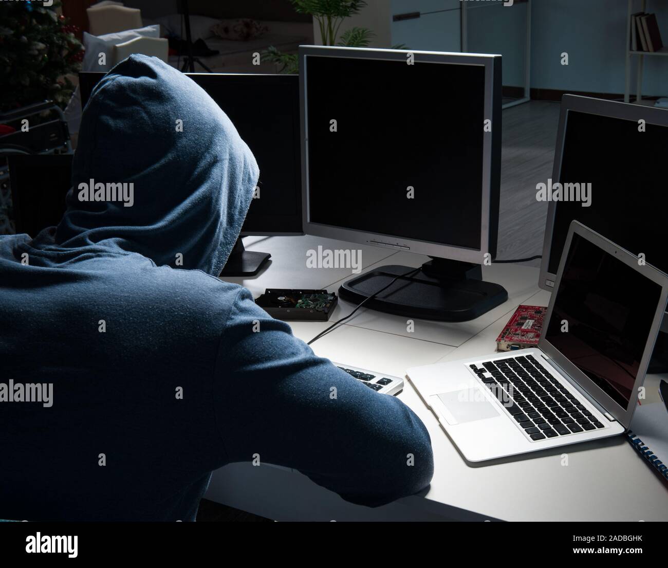 Hacker hacking computer at night Stock Photo - Alamy