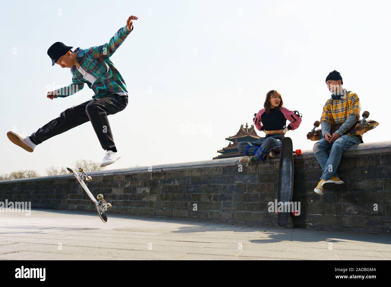 Young people skateboarding Stock Photo - Alamy