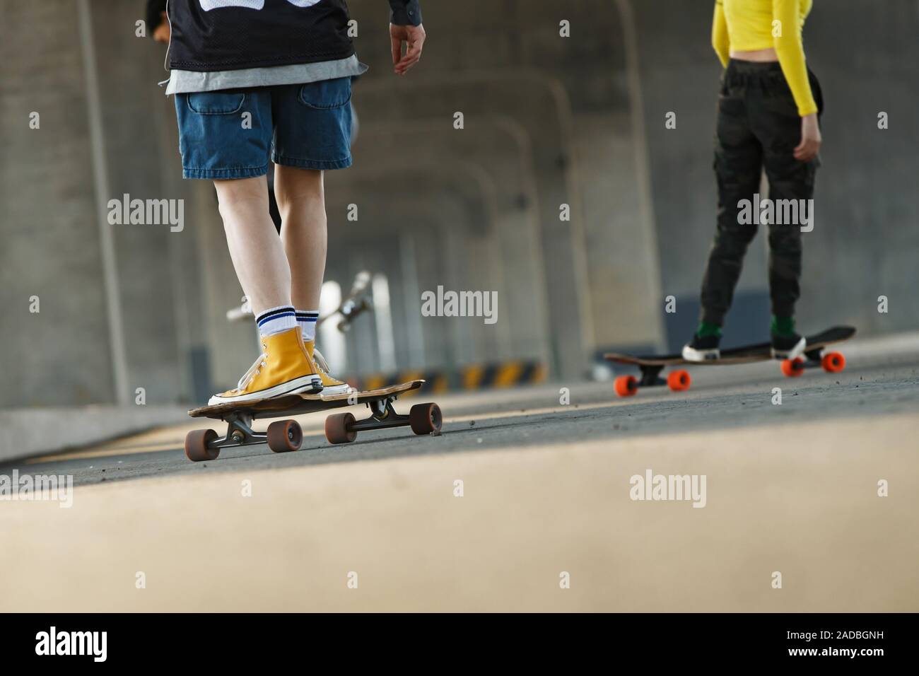 Young people skateboarding Stock Photo - Alamy