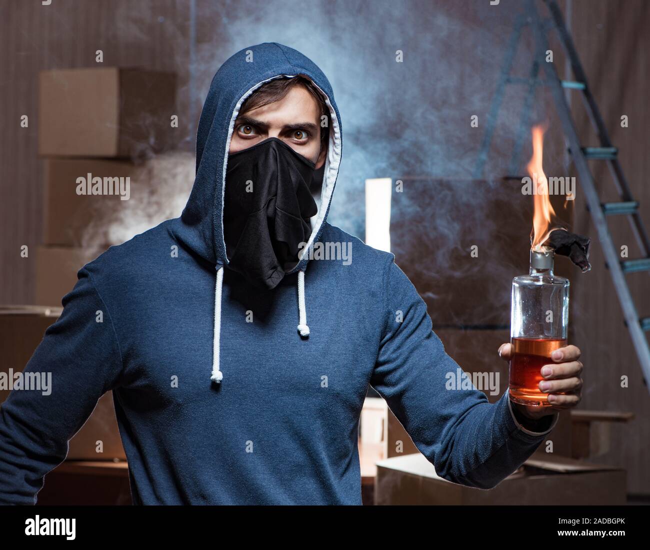 Throwing molotov cocktail hi-res stock photography and images - Alamy