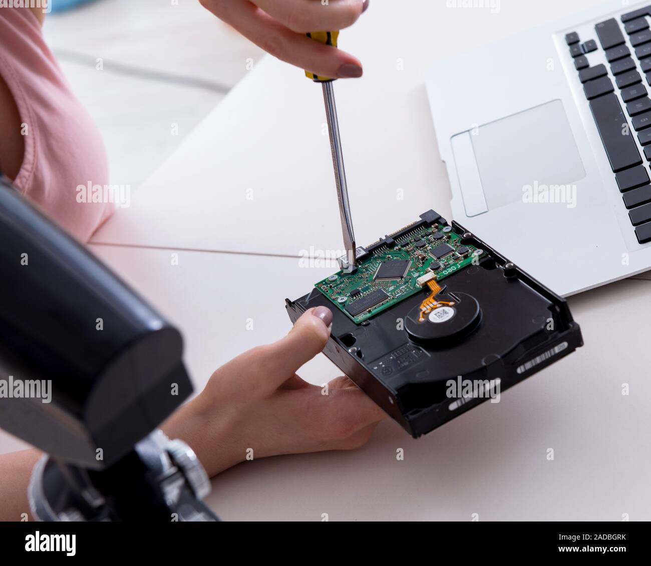 Hard drive repair and data recovery with restoration Stock Photo - Alamy
