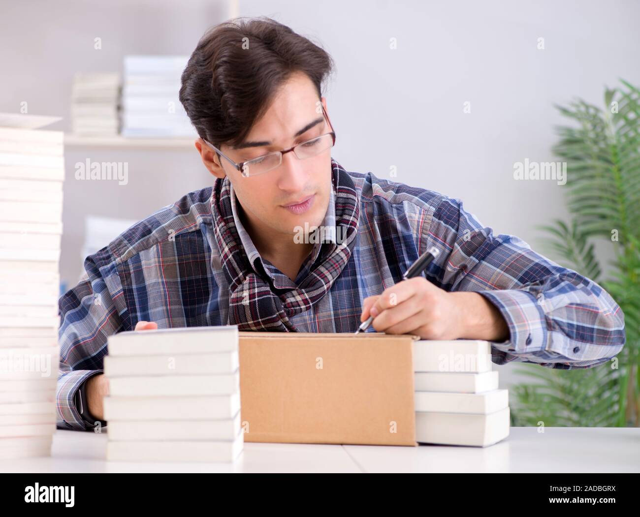 Writer presenting his books to public Stock Photo - Alamy