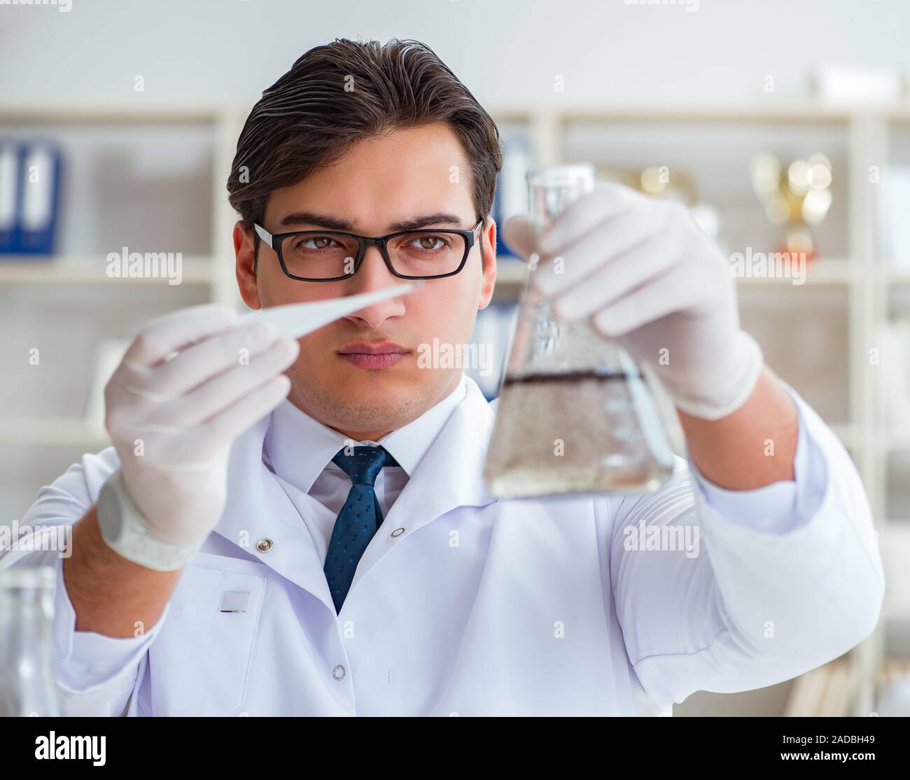 Young researcher scientist doing a water test contamination expe Stock ...