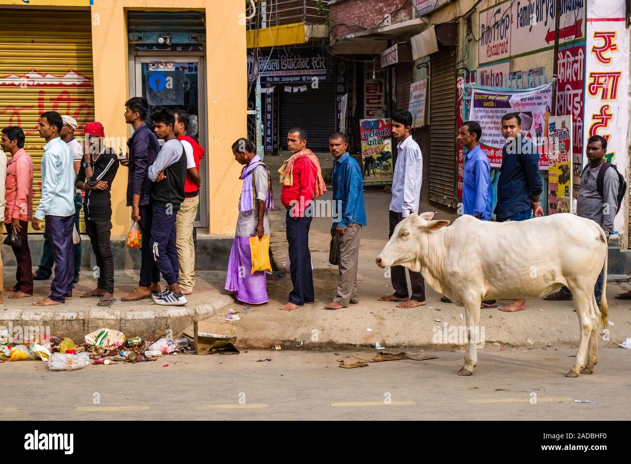 Men queuing up hi-res stock photography and images - Alamy