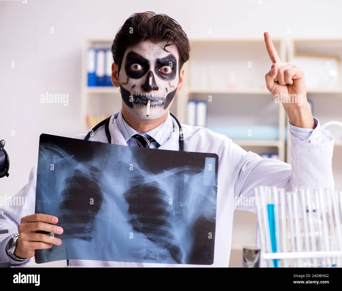 Scary monster doctor working in lab Stock Photo - Alamy
