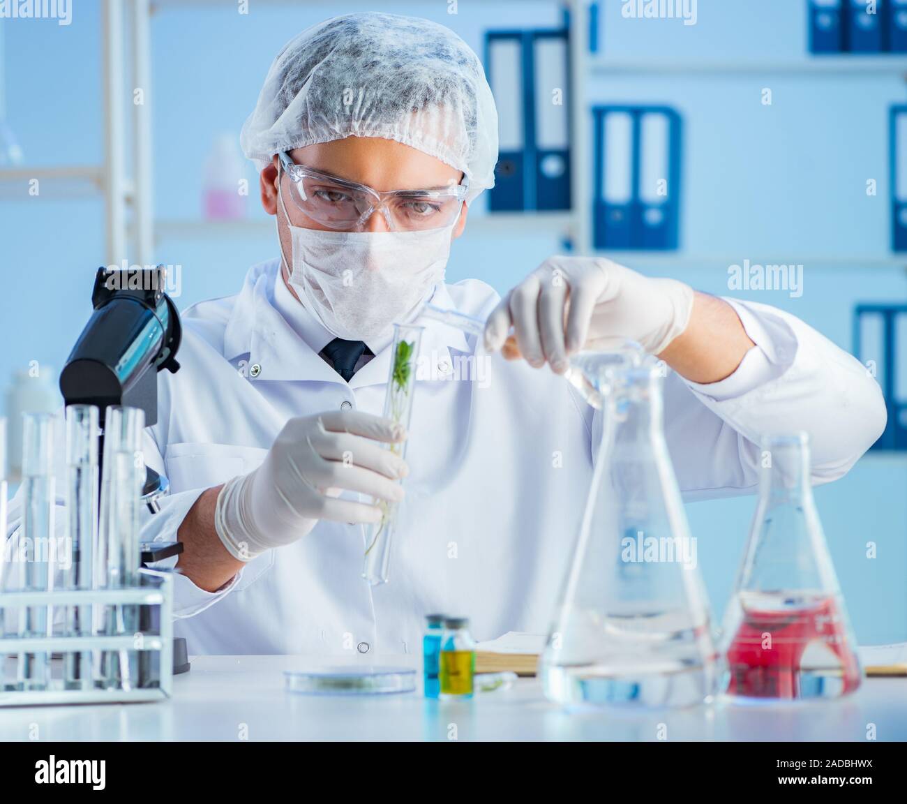 Biotechnology concept with scientist in lab Stock Photo - Alamy