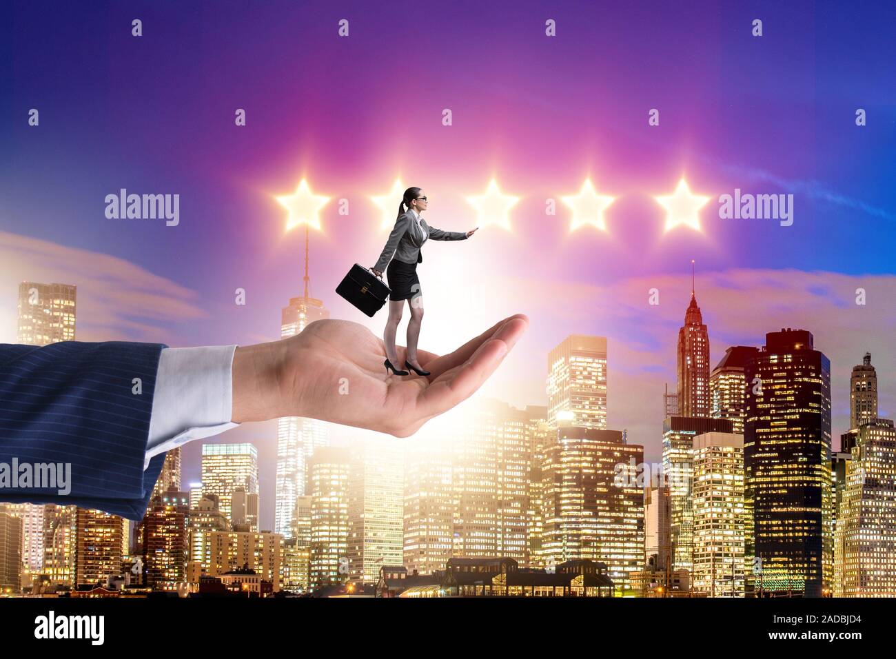 Hand holding Businesswoman in success and promotion concept Stock Photo ...