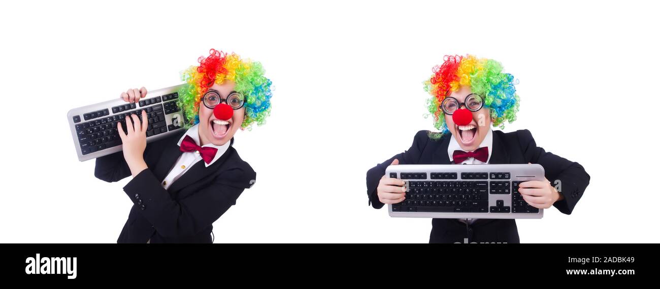 Funny clown with keyboard on white Stock Photo - Alamy