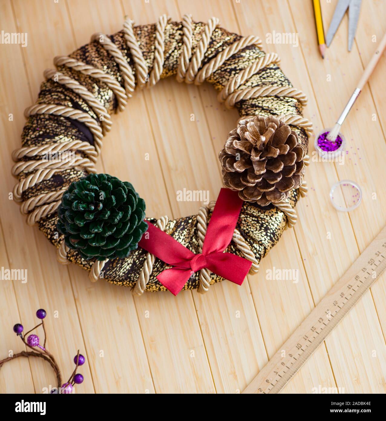 Woman doiing DIY festive decorations at home Stock Photo - Alamy