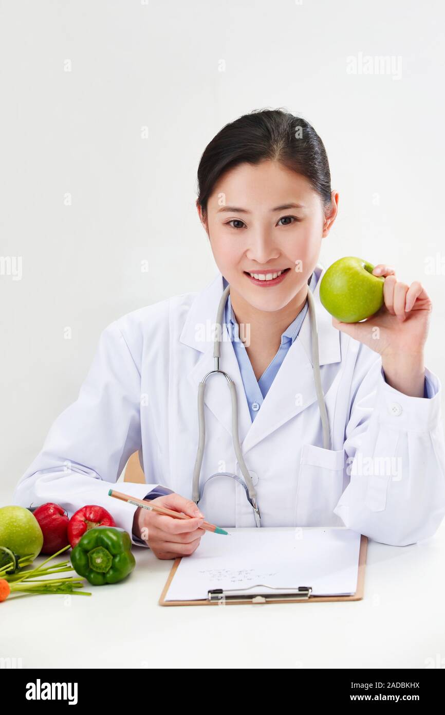 Doctor checking food hi-res stock photography and images - Alamy