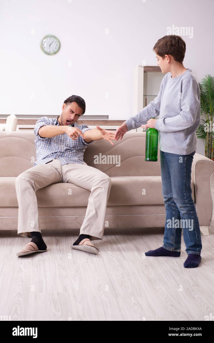 Drunk father and his son Stock Photo - Alamy