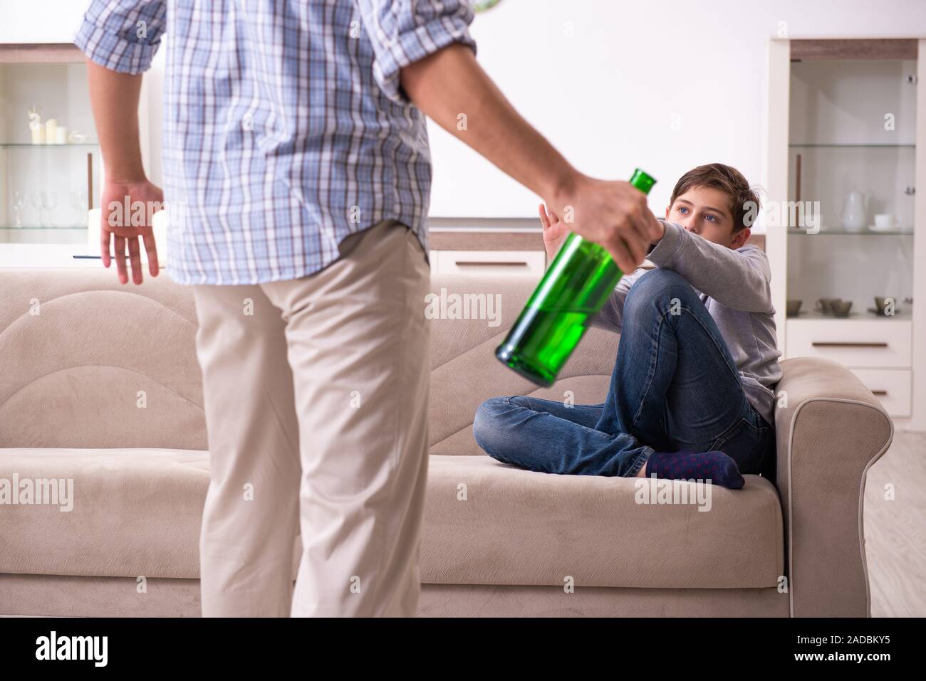 Father beating and punishing his sone Stock Photo - Alamy