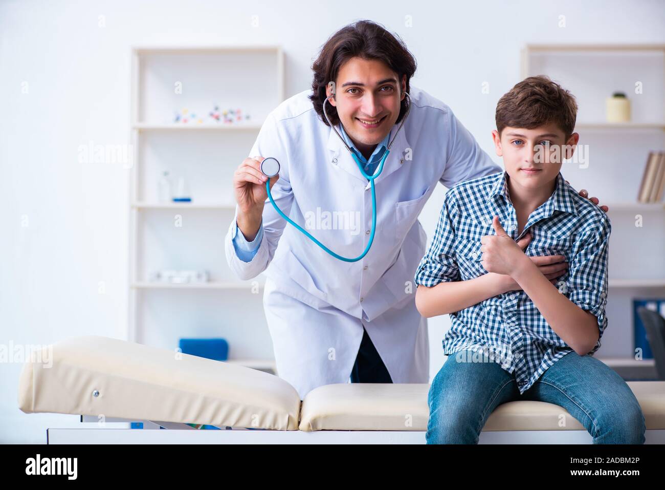 Boy listening heart beat stethoscope hi-res stock photography and ...