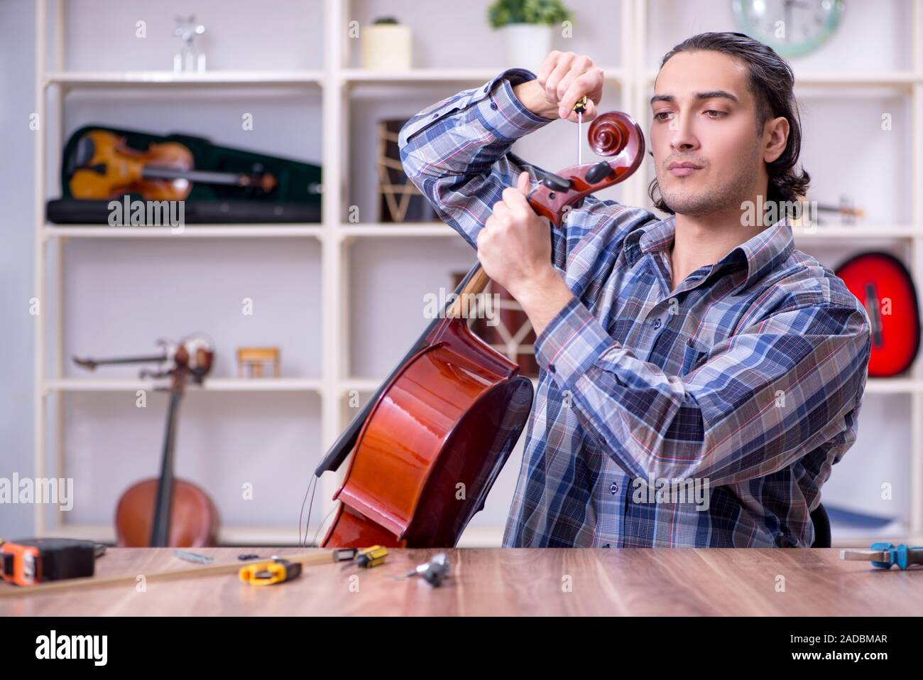 Cello repair hi-res stock photography and images - Alamy