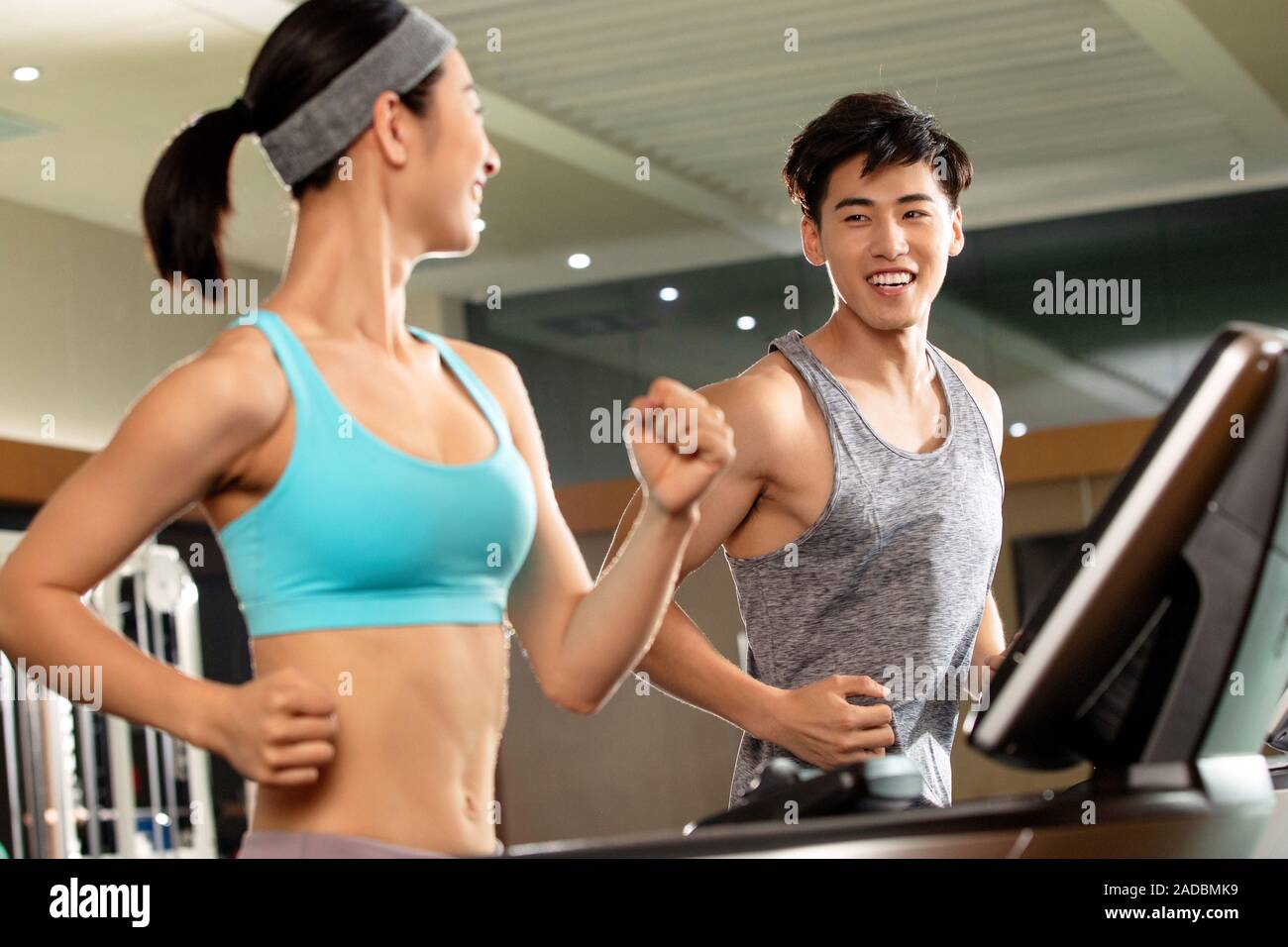 Young people in the gym to work out Stock Photo - Alamy