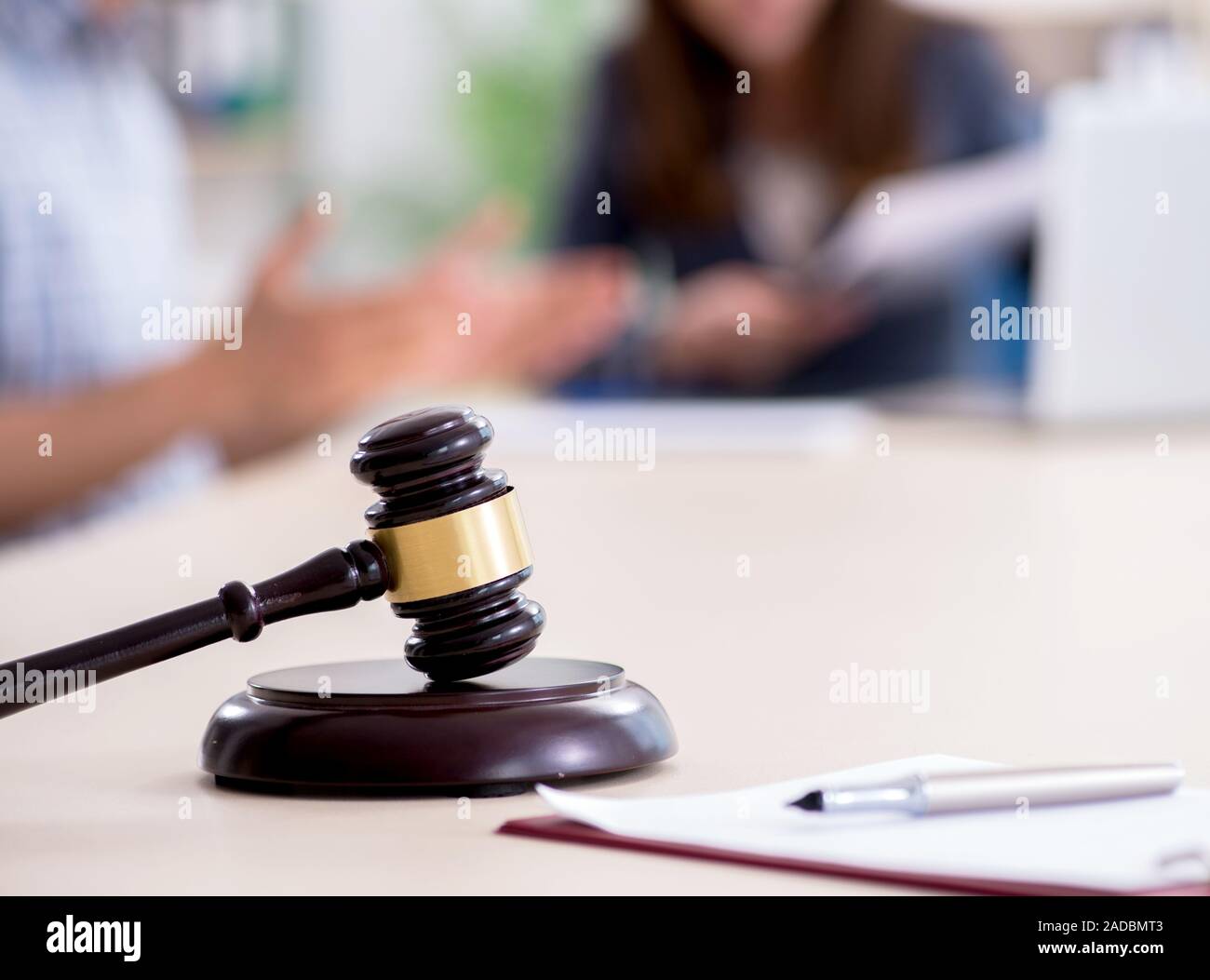Female lawyer meeting with his male client in the office Stock Photo ...