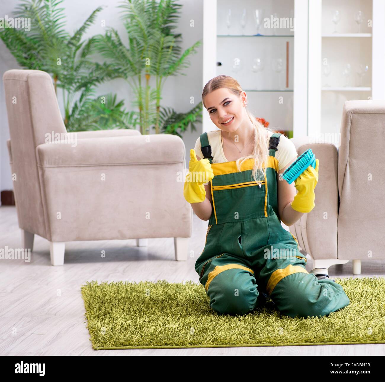 Cleaning service female worker carpet hi-res stock photography and ...