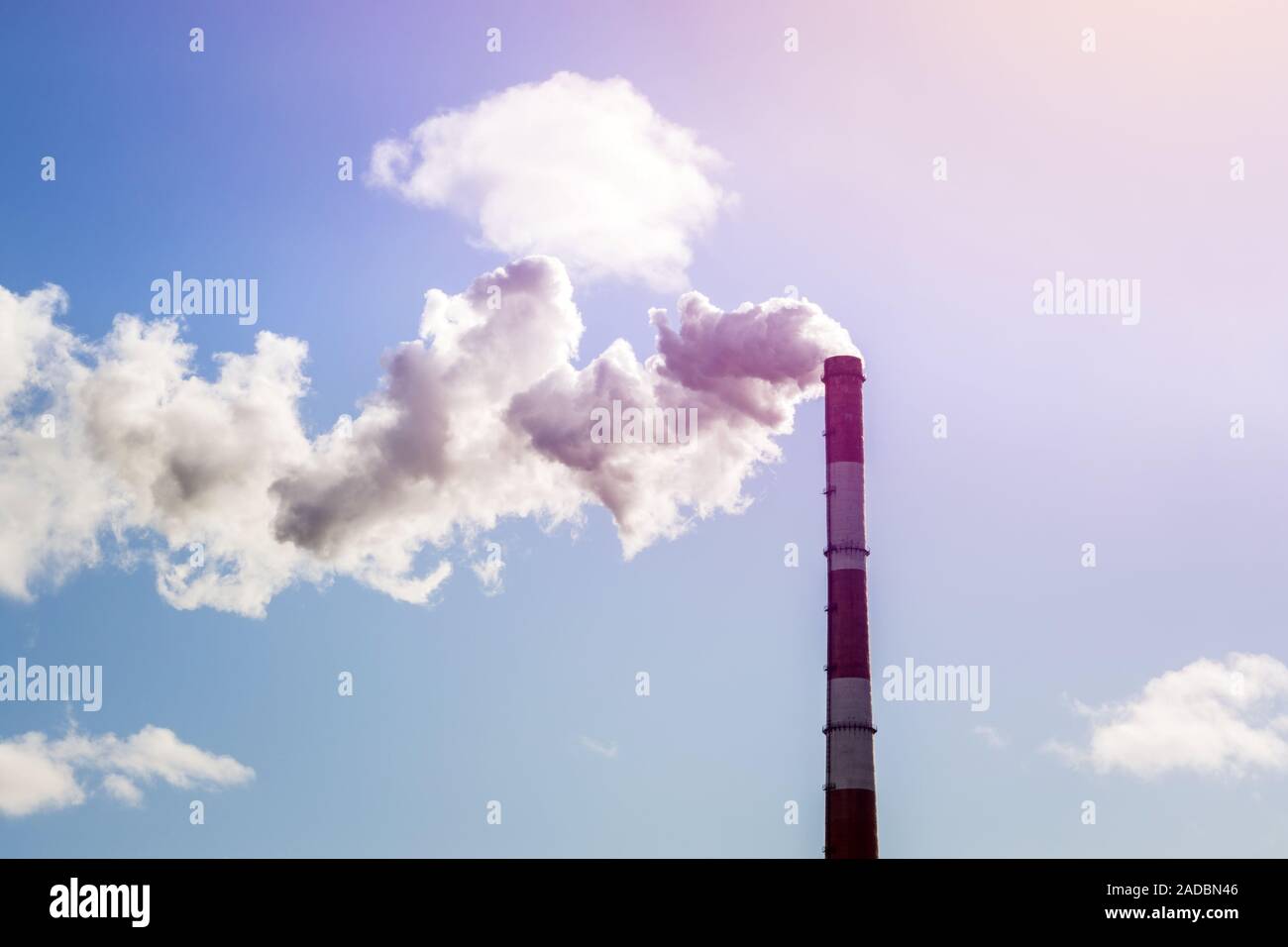 pipe of the plant emits harmful substances into the atmosphere. Close ...