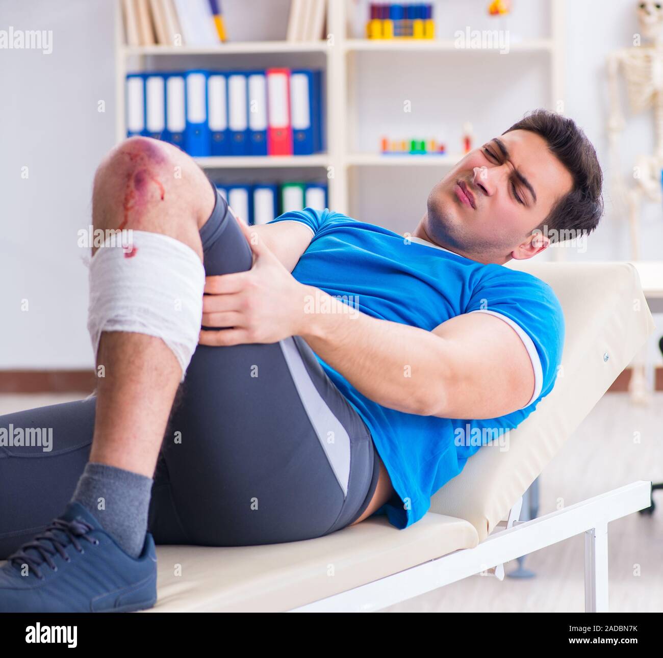 Patient visiting doctor after sustaining sports injury Stock Photo - Alamy