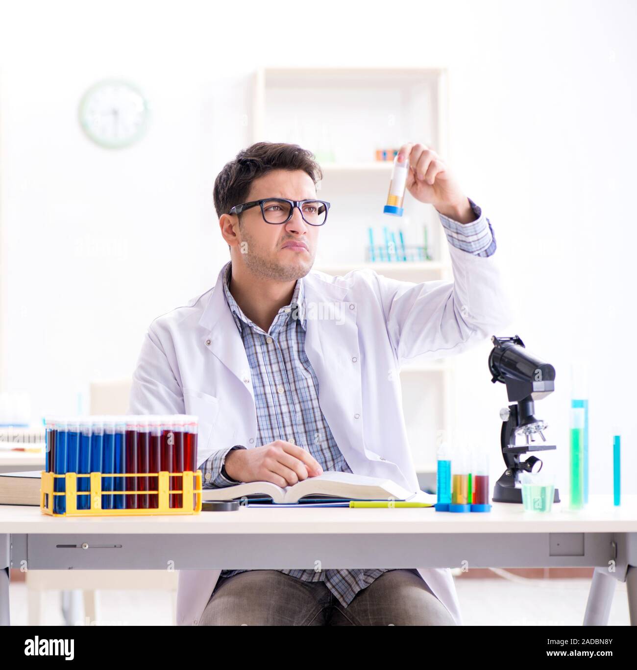 Chemistry class student doing experiment hi-res stock photography and ...