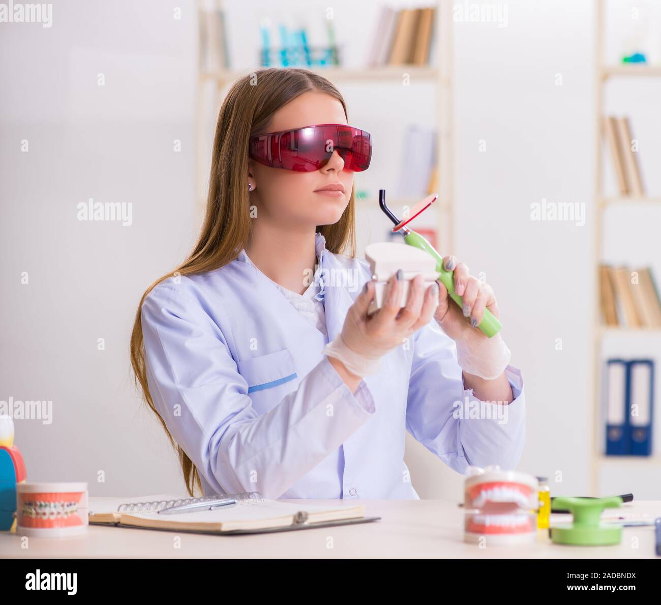 Dentistry student practicing skills in classroom Stock Photo - Alamy