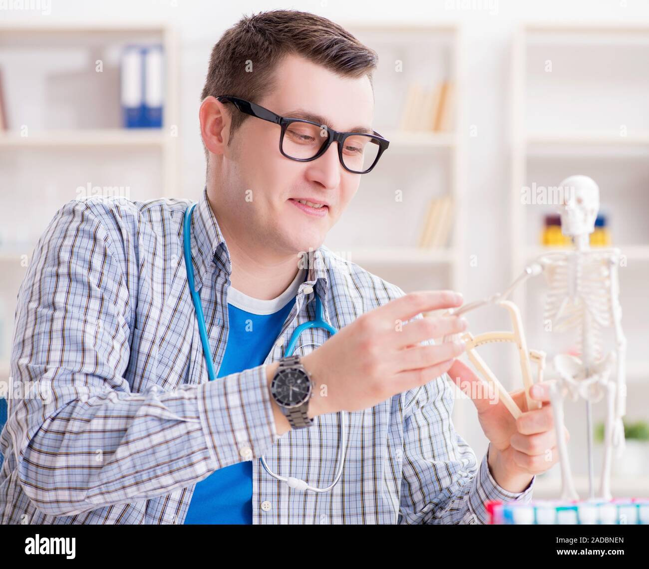 Medical student studying skeleton in classroom during lecture Stock ...