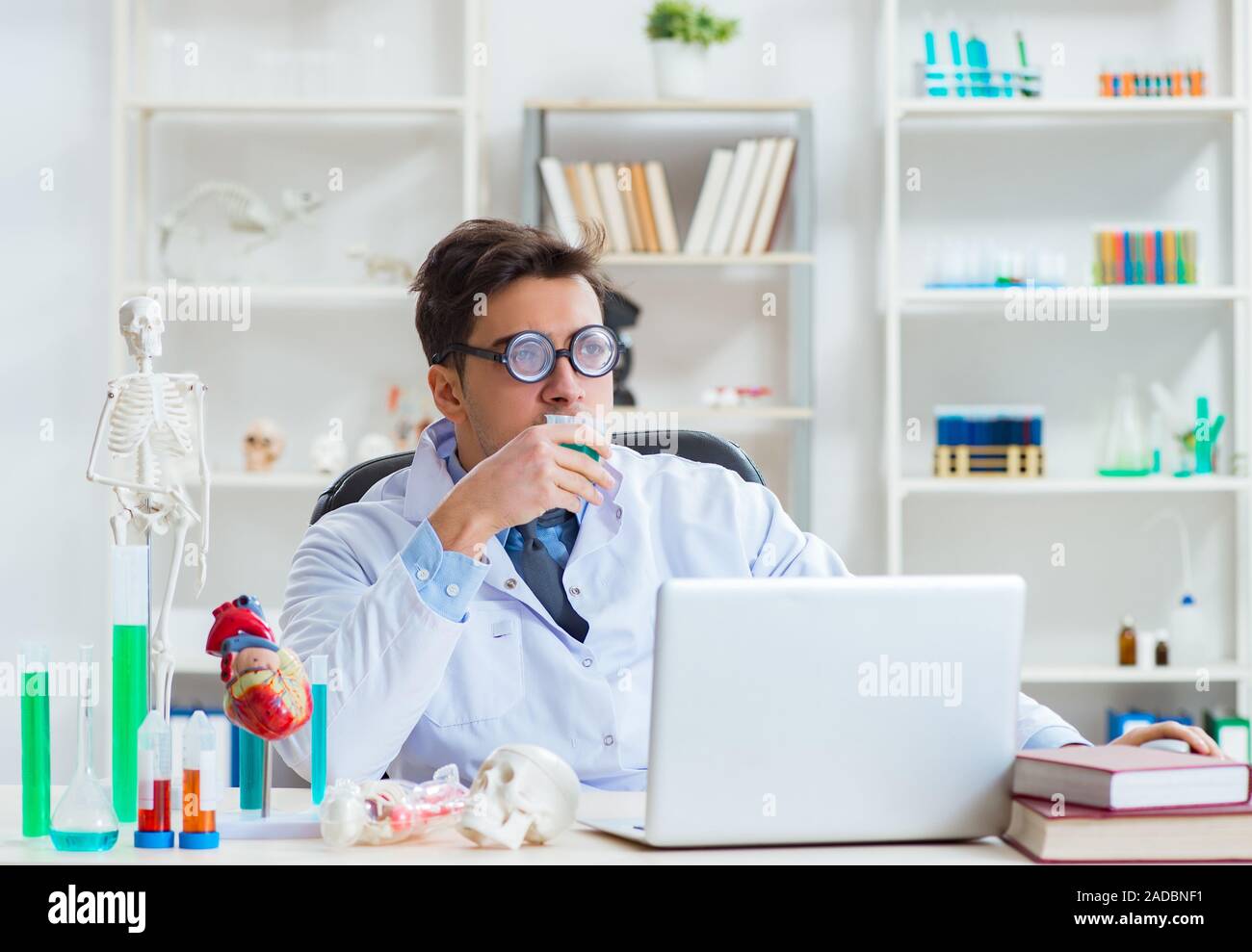 Funny doctor having fun in hospital lab Stock Photo - Alamy