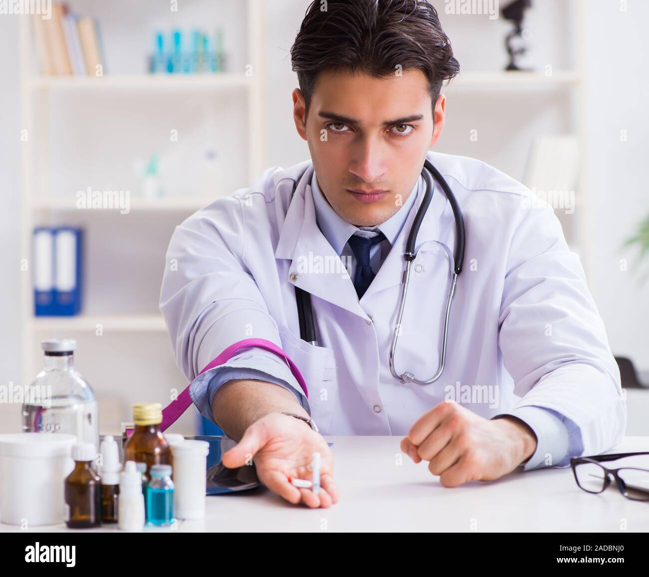 Doctor drug addict in the hospital Stock Photo - Alamy