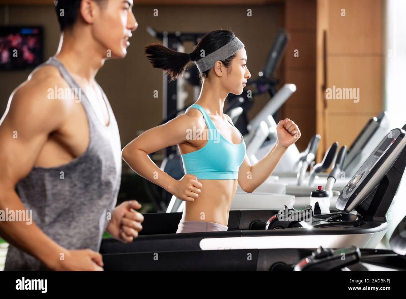 Young people in the gym to work out Stock Photo - Alamy