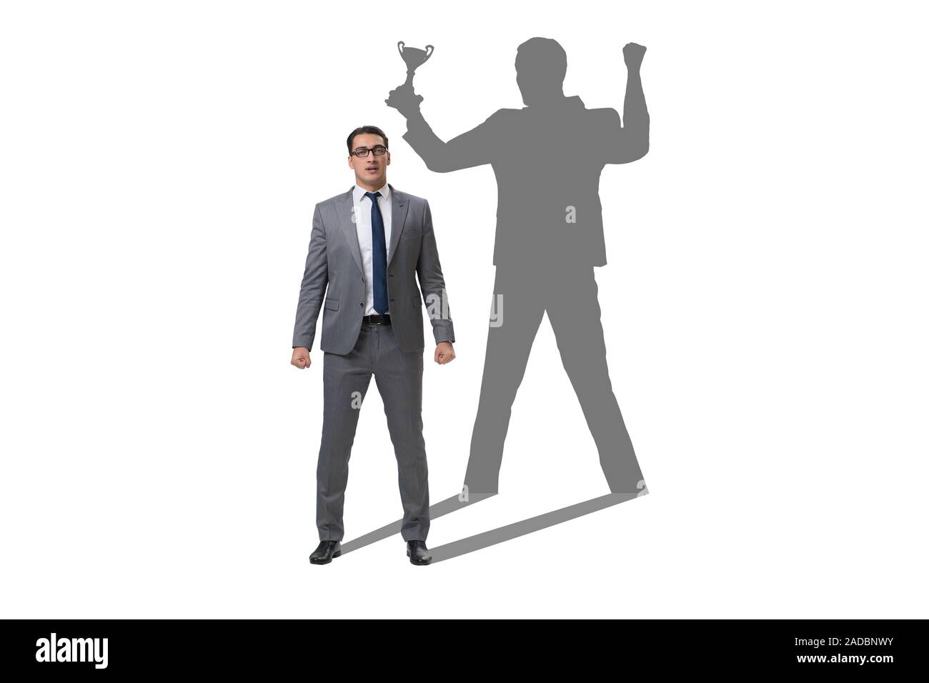 Successful businessman trophy in Cut Out Stock Images & Pictures - Alamy
