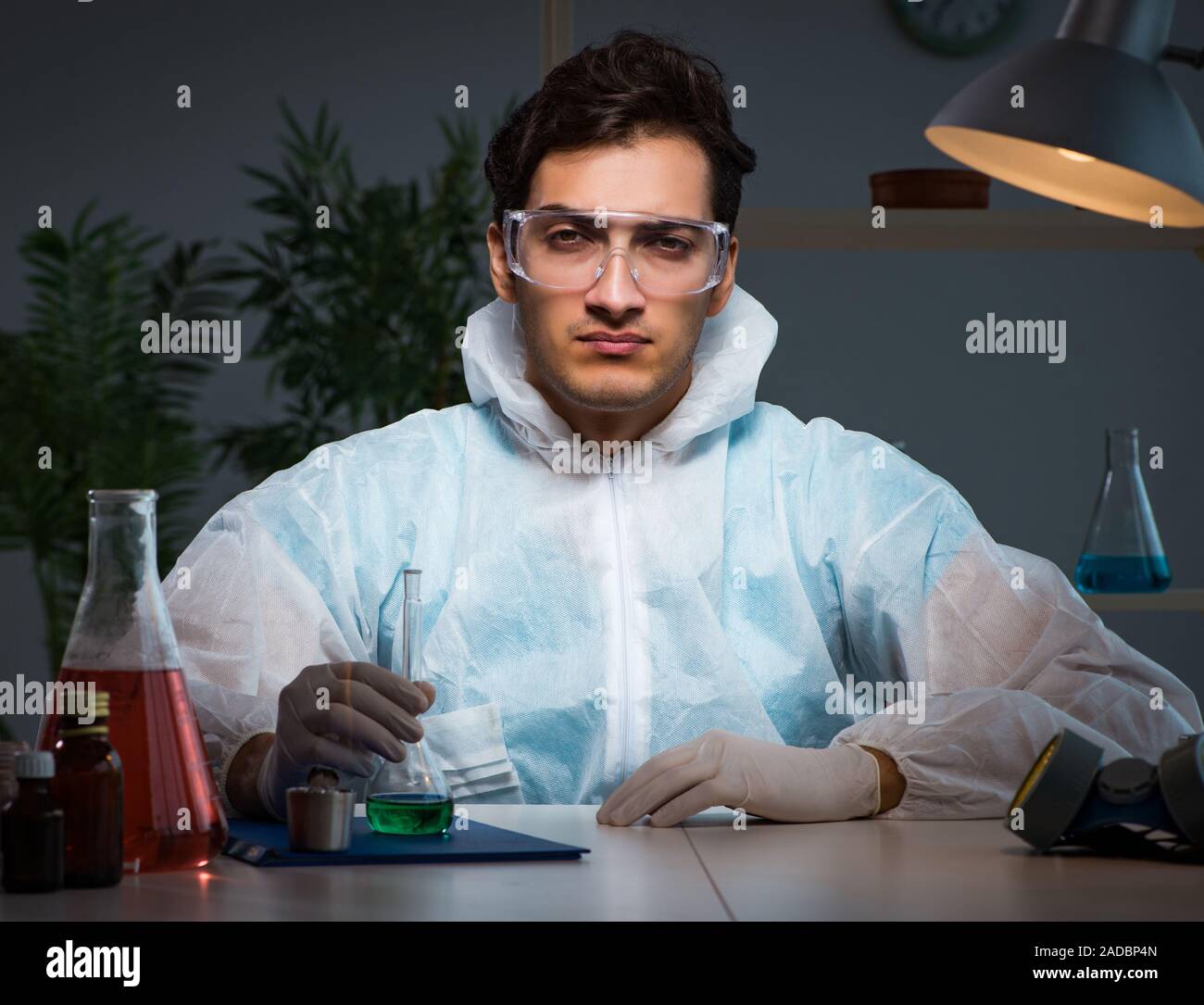 Young male chemist late hi-res stock photography and images - Alamy