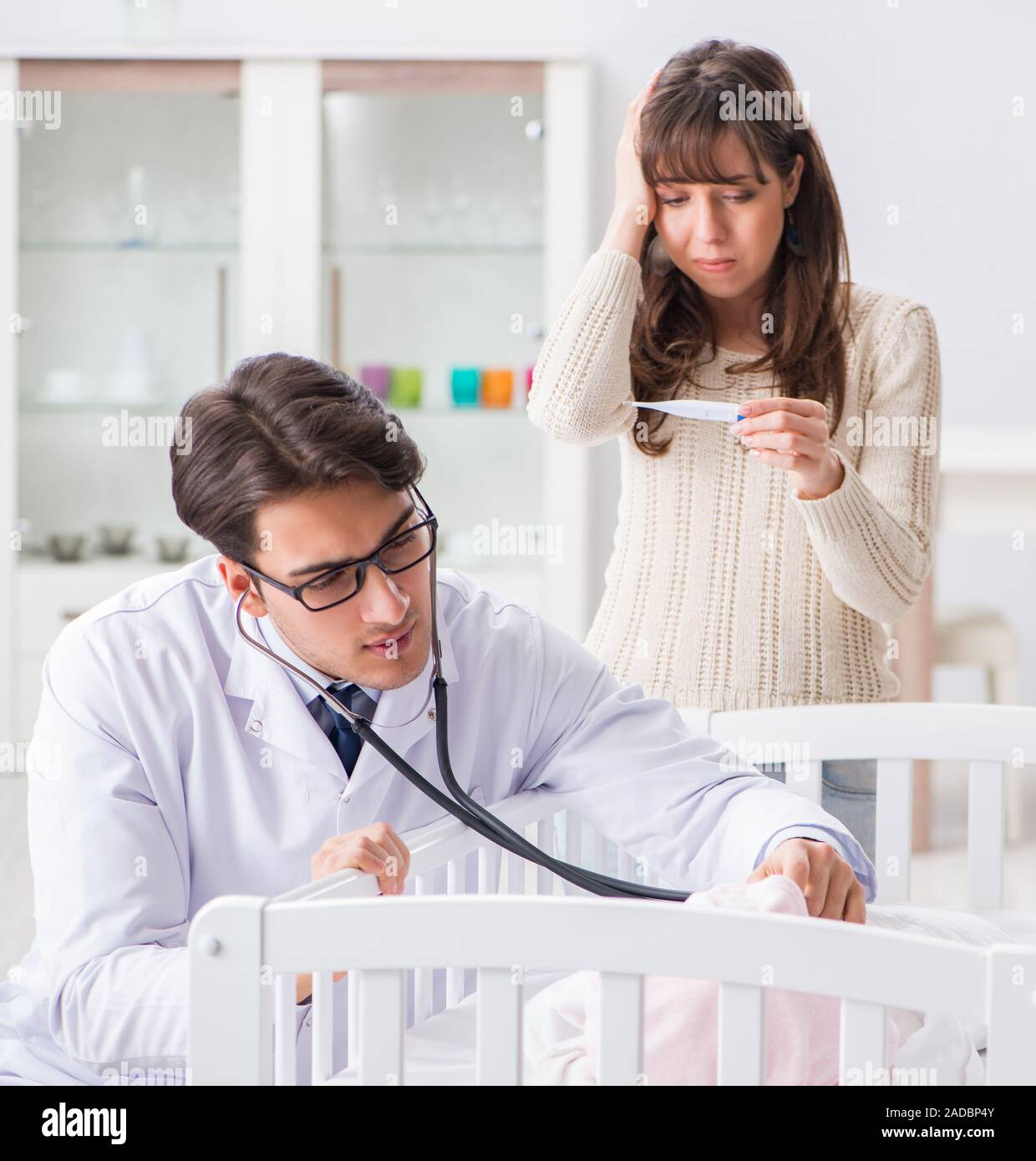 Medical with mother cot hi-res stock photography and images - Alamy