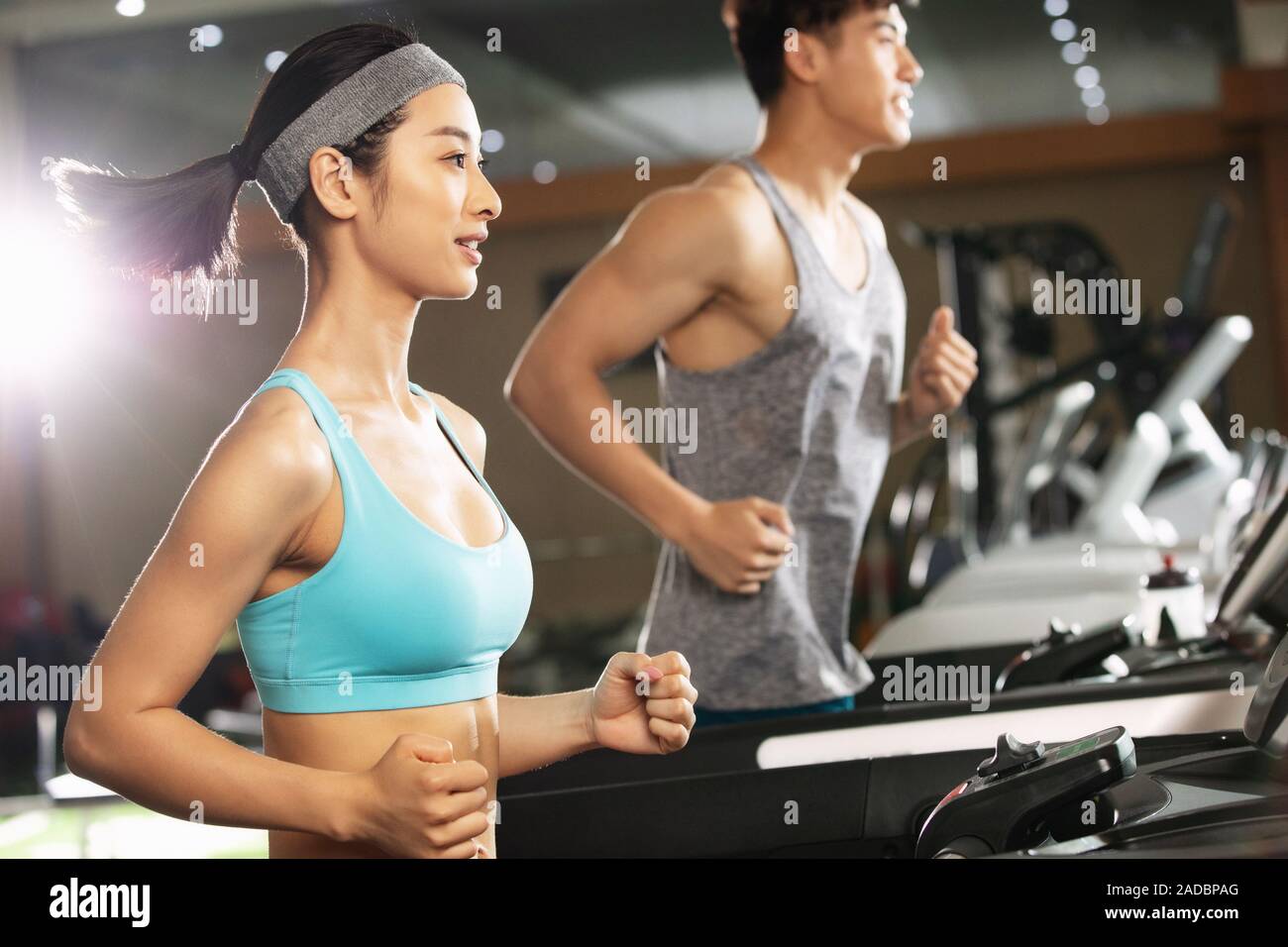 Young people in the gym to work out Stock Photo - Alamy