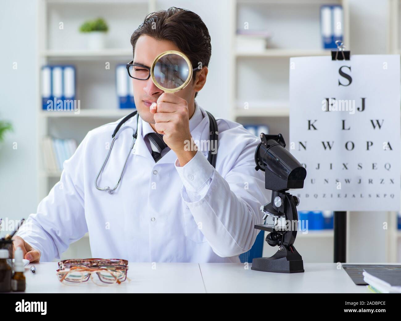The eye doctor in medical concept Stock Photo - Alamy