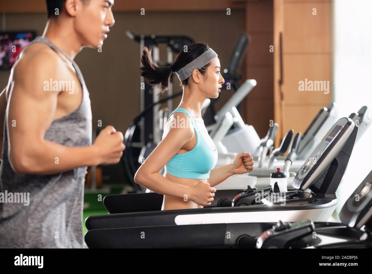Young people in the gym to work out Stock Photo - Alamy