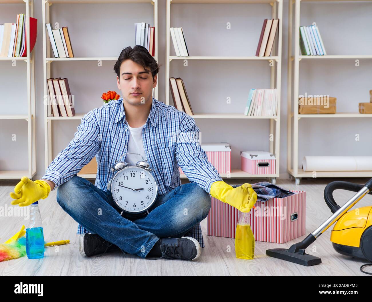 Man cleaning clock hi-res stock photography and images - Alamy