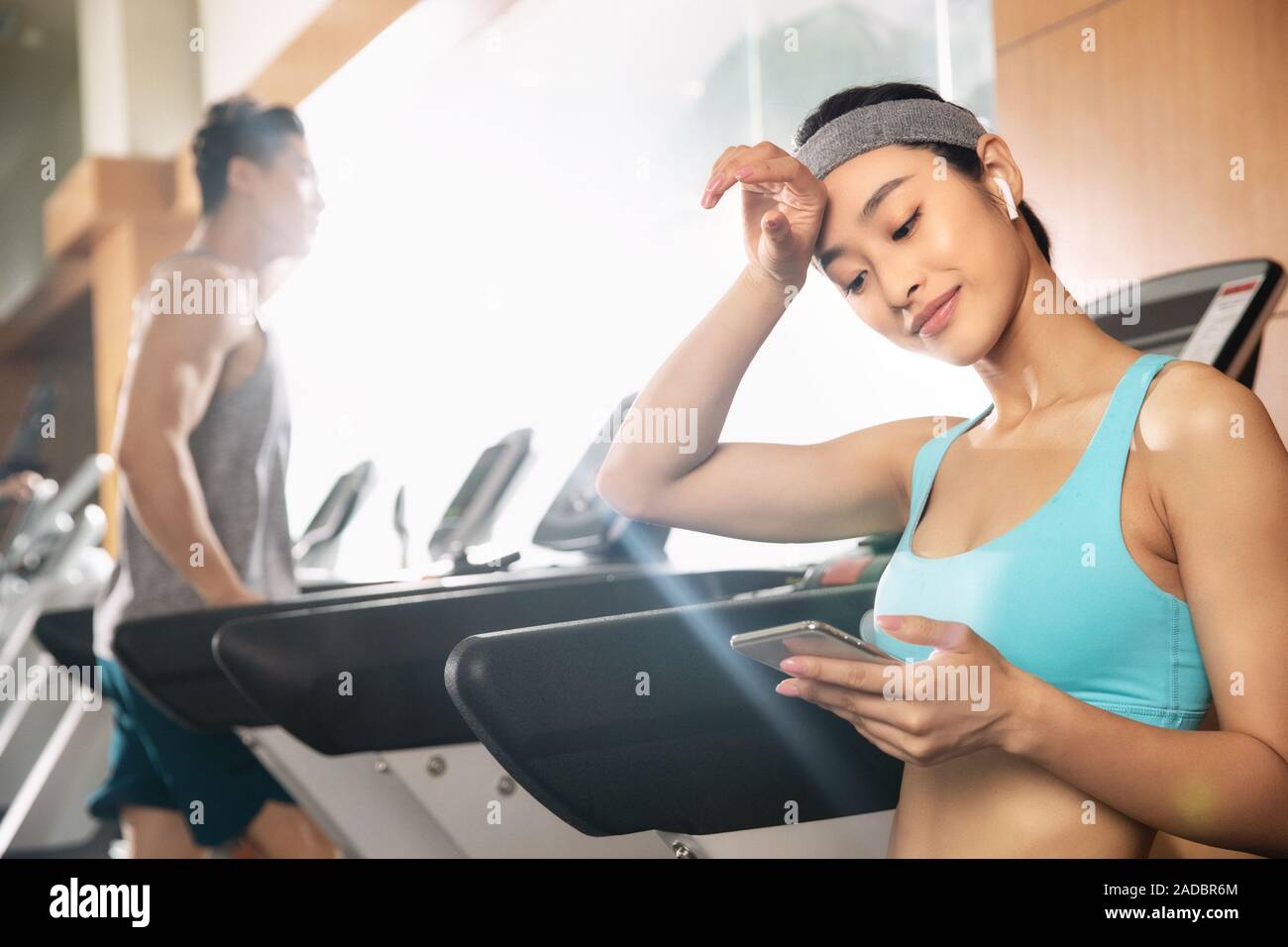 Young people in the gym to work out Stock Photo - Alamy