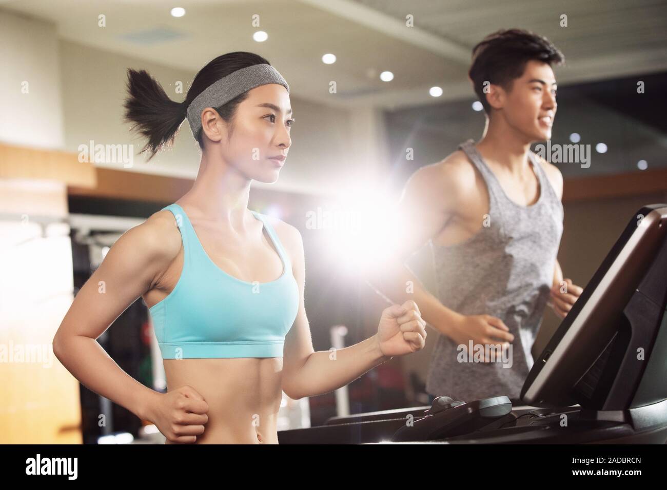 Young people in the gym to work out Stock Photo - Alamy