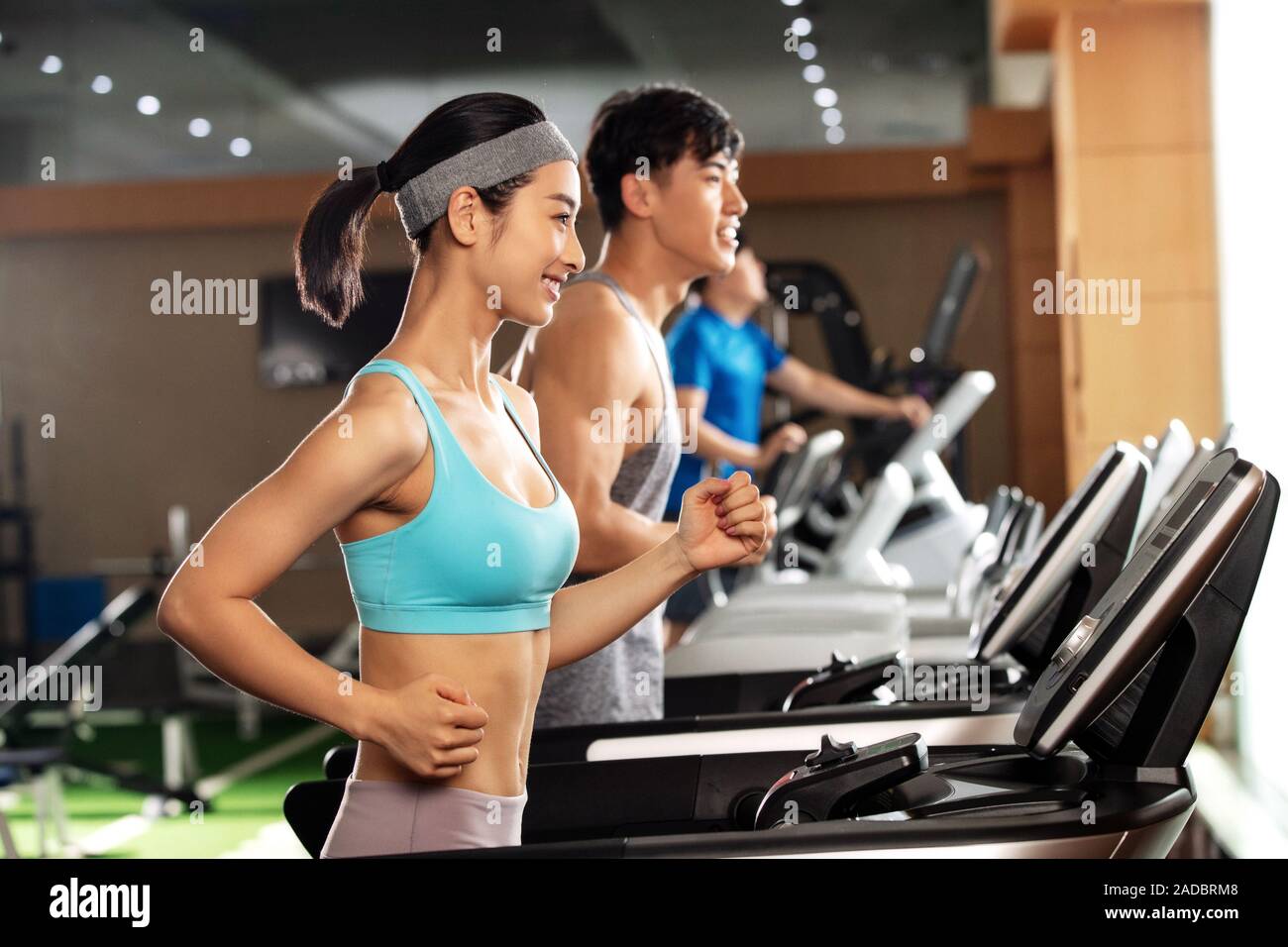 Young people in the gym to work out Stock Photo - Alamy