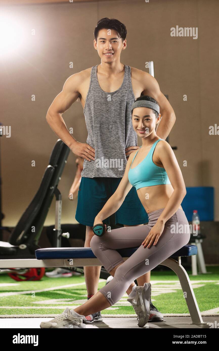 Young people in the gym to work out Stock Photo - Alamy