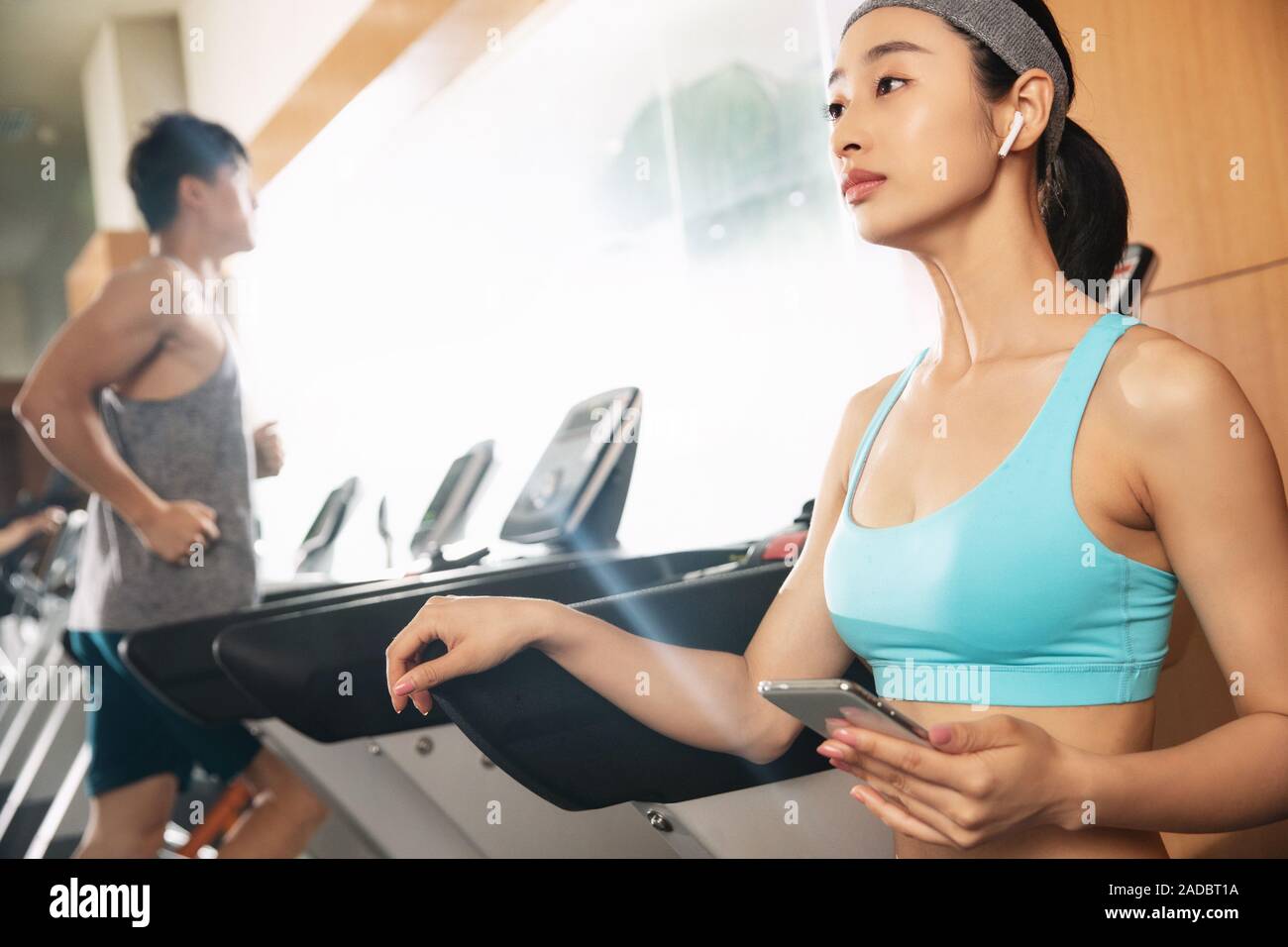 Young people in the gym to work out Stock Photo - Alamy