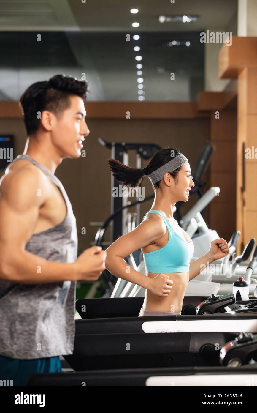 Young people in the gym to work out Stock Photo - Alamy