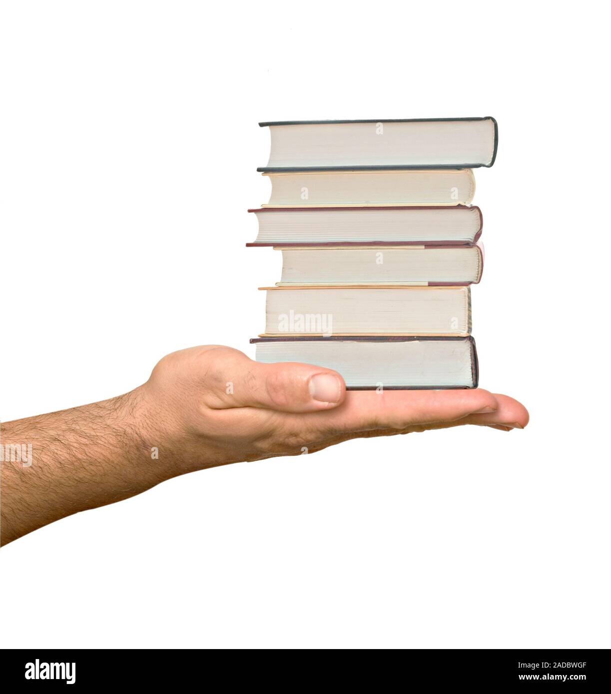 hand giving pile of book as a gift of knowledge Stock Photo - Alamy