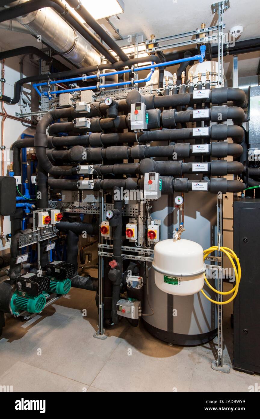 Residential heating system. Array of pipes, pumps and controls used to ...