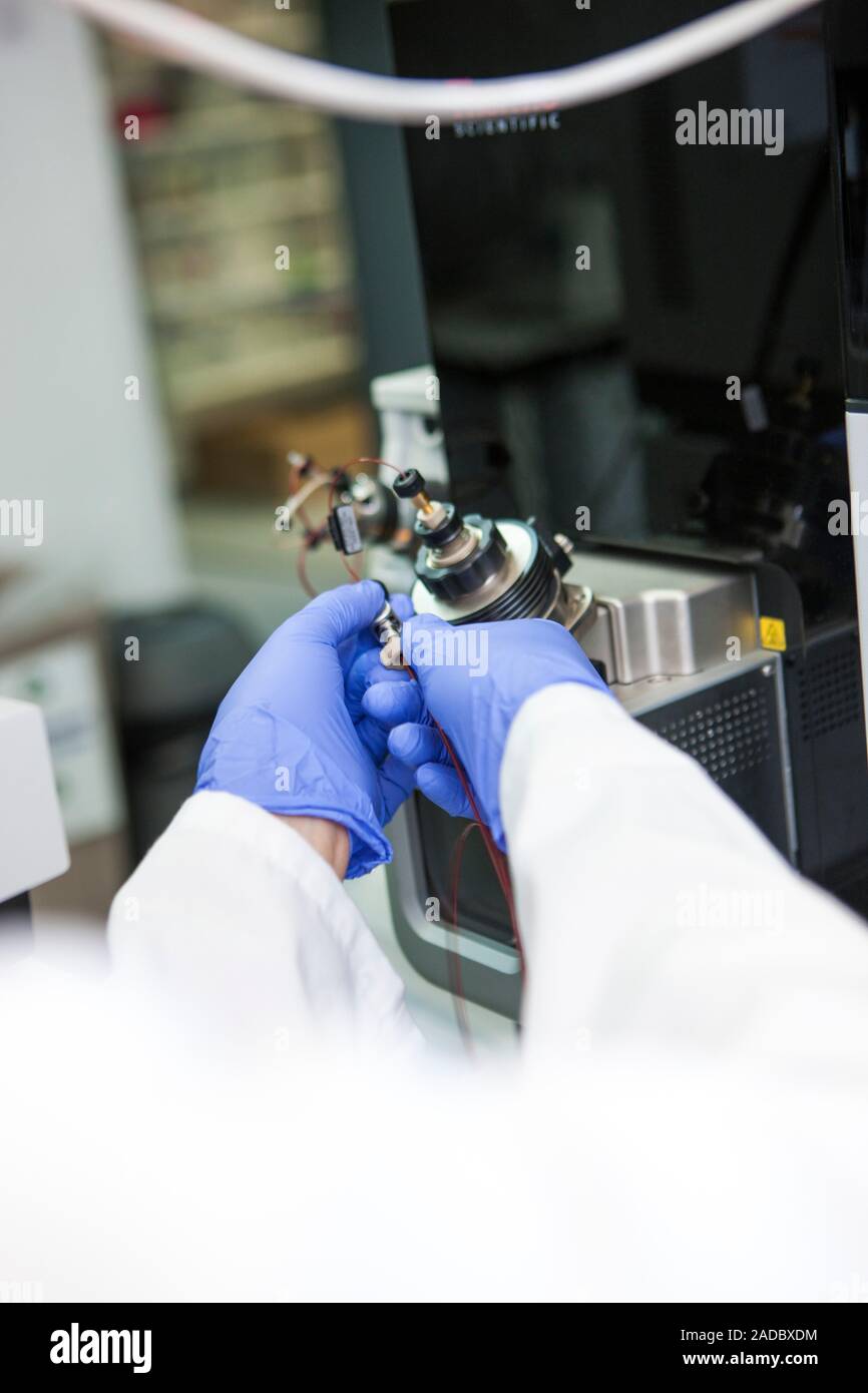Mass spectrometry and protein analysis. Close-up of a researcher ...